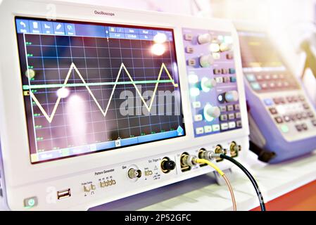 Modern mixed signal oscilloscope in lab Stock Photo - Alamy