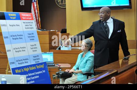 Former APS area superintendent Tamara Cotman listens to opening ...