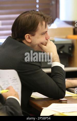 Brett T. Seacat listens to testimony from a witness during the the ...