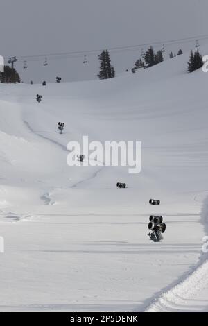 Black snow making machines on the Broadway ski run at Mammoth Mountain ...