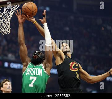 Boston Celtics' Jaylen Brown (7) grabs rebound against New York Knicks ...