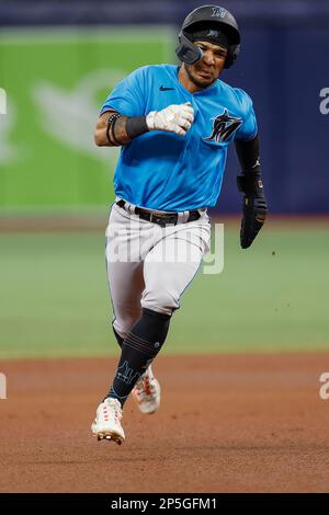 Miami Marlins' Victor Mesa Jr., left, talks with San Francisco Giants ...