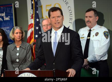 Middlesex District Attorney Gerry Leone talks to the media after John ...