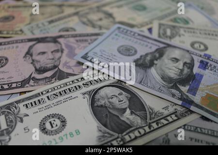 Pile of US dollar bills of varying monetary value Stock Photo - Alamy
