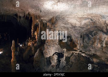 Dripstone column in the tourist attraction cave Stock Photo - Alamy