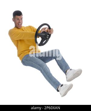 Angry man on stool with steering wheel against white background Stock ...