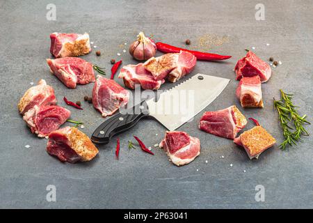 Raw pork shoulder pieces with ground spices. Fresh meat cut, ingredient ...