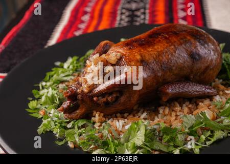 Arabic Cuisine; Egyptian traditional stuffed pigeon or "Hamam Mahshi ...