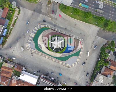 aerial view of Tugu Pancakarsa in the morning at the crossroads side by ...