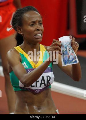 Ethiopia's Meseret Defar wins the Women's 5000m at the London Olympics ...