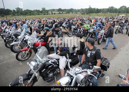 Motorcycle riders wait for the start of the annual autumn charity ride ...