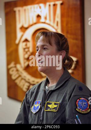 Family members of Air Force Col. Paul Zurkowski, a pilot assigned to ...
