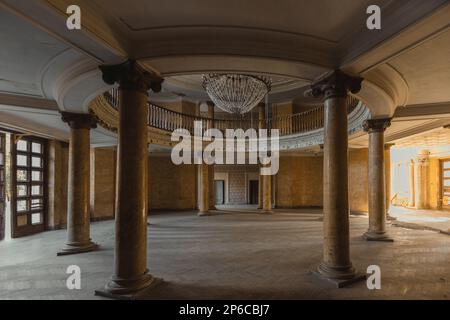 Entrance round hall with chandelier at the abandoned palace Stock Photo ...