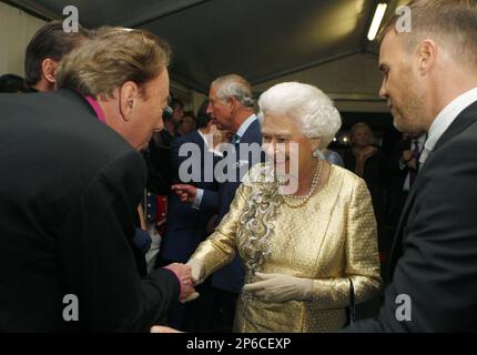 Queen Elizabeth II meets Sir Bobby Charlton CBE and his wife Lady ...