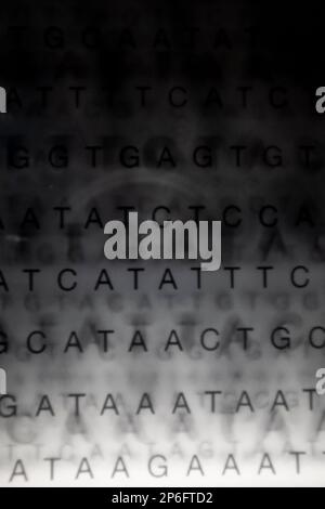 Written letters code on a translucent surface Stock Photo - Alamy