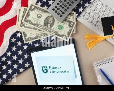 In this photo illustration, Tulane University logo seen displayed on a ...