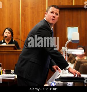 Assistant Attorney General Andrew Bauch questions witness Michael ...