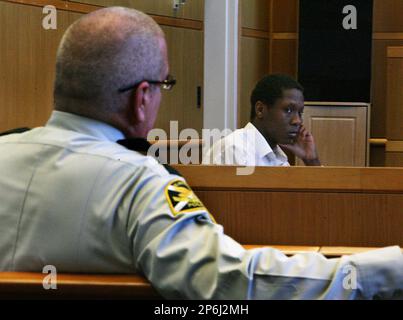 Defendant Nicholas Lindsey listens as potential jurors are questioned ...