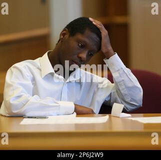 Defendant Nicholas Lindsey listens as potential jurors are questioned ...