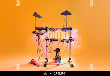 Modern electronic drum kit and smoke on dark background. Musical ...