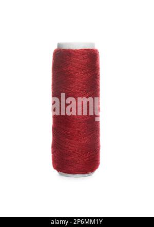 Spool of dark red sewing thread isolated on white Stock Photo - Alamy