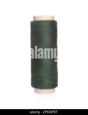 A bobbin of dark green thread isolated with its reflection on white ...
