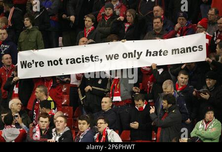 Liverpool fans hold up a banner during the Premier League match at ...