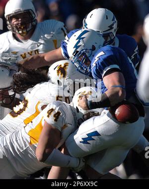 Air Force quarterback Connor Dietz (11) rolls out after taking the snap ...