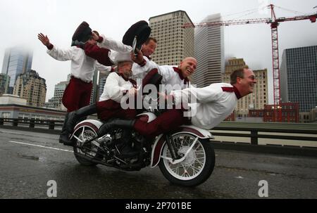 Members of the Seattle Cossacks Motorcycle Stunt team perform for the ...