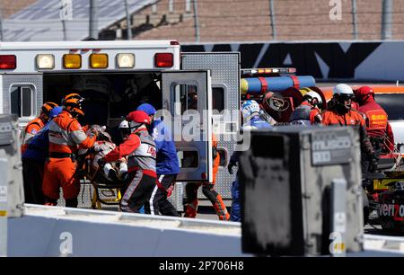 October 16, 20011: Izod Indycar Series driver Dan Wheldon is loaded ...