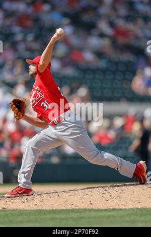 St. Louis Cardinals pitcher Andrew Miller makes a jumping catch on a ...