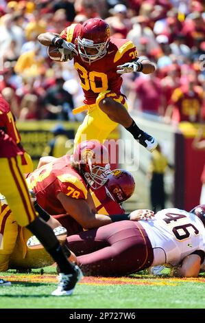 USC Trojans cornerback Brian Baucham (30) intercepts a pass during an ...