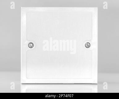 Plastic distribution board. Electrical board. Close-up. Isolated on ...