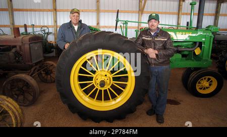A 1937 John Deere Model A tractor with cultivators attached Stock Photo ...