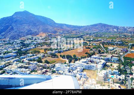 Kamari village overview from landing airplane over the sea, Santorini ...