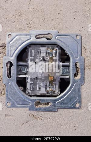 Work on installing electrical outlets with electrical wires and ...