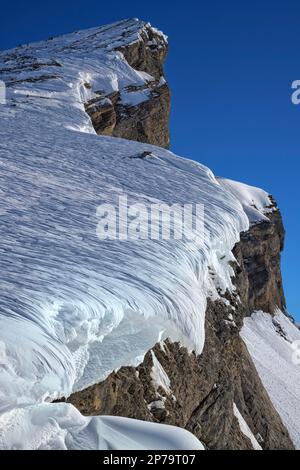 Structured snow cornices in an ice and snow landscape, Gemmi, Valais ...