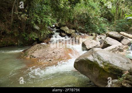 Peaceful shot of the hot spring of Malanage on Flores flowing down ...