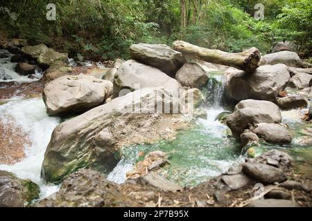 Peaceful shot of the hot spring of Malanage on Flores flowing down ...