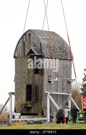 Etingen, Germany. 08th Mar, 2023. A worker climbs from a lifting ...