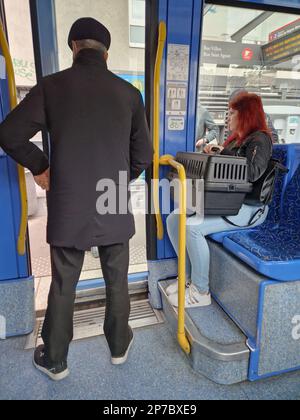 Passengers in a tram train, Lyon, France Stock Photo - Alamy