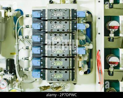 Factory infrastructure of wiring and plumbing Stock Photo - Alamy