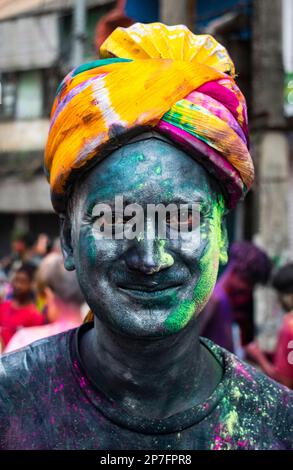Revellers smear with Gulal or coloured powder and dance to play Holi ...