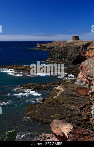 Torre Del Aguila-Castillo De Las Coloradas tower on headland with ...