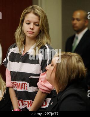 Elizabeth Johnson, left, mother of missing baby Gabriel, reacts to ...
