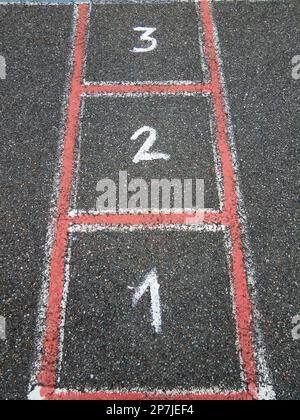 number three painted on asphalt Stock Photo - Alamy