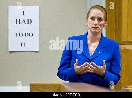 Barbara Wing, mother of Kelly Wing Schmidt, cries while listening to ...
