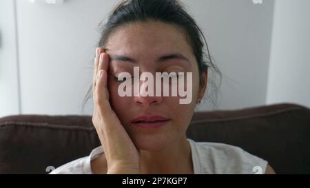 Sad woman taking a deep breath feeling anxious. Crying female person ...