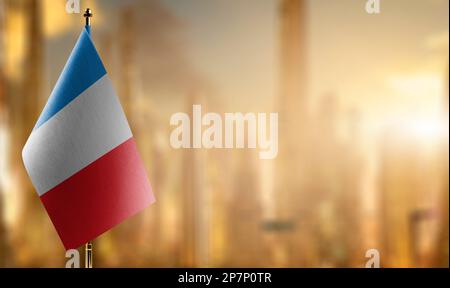 Small flags of the France on an abstract blurry background Stock Photo ...