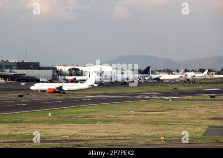 Airplane on runway getting ready for take off or parking Stock Photo ...